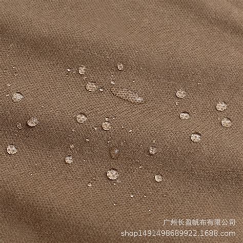 长盈直供8安过蜡棉帆布油蜡涂蜡过蜡涤棉复古防潮风衣面料棕红 阿里巴巴
