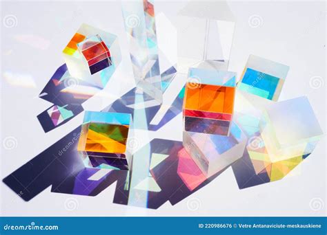 Abstract Background With Glass Geometric Figures Prisms With Light Diffraction Of Spectrum