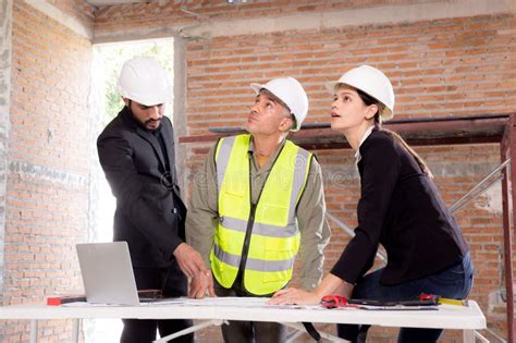 Team Architect Or Engineer Man And Woman Meeting For Planning And