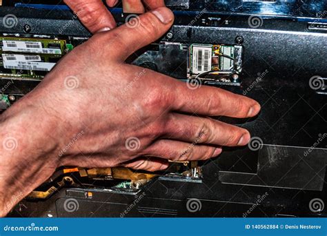 Self Disassembly Of A Laptop Electronics Laptop Repair Male Hands Stock Photo Image Of