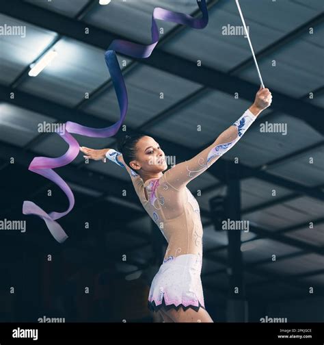 Ribbon gymnastics, woman and dancing in performance, training show and ...
