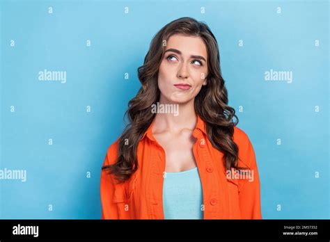 Portrait Photo Of Young Pretty Thinking Cute Brunet Hair Lady Pouty