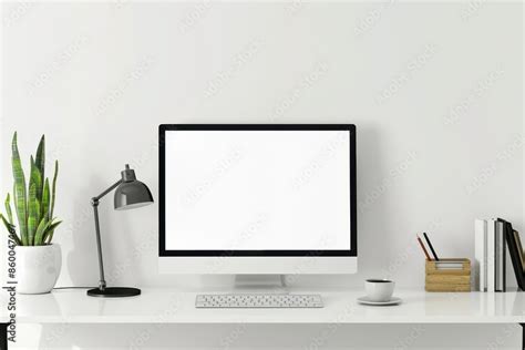 Modern Minimalist Workspace With Desktop Computer Potted Plant Lamp