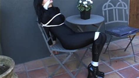 Sexy Cat Burglar Edanya Sat Squirming Bound And Gagged On A Chair After She Was Caught By
