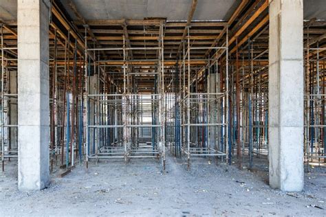 Scaffolding Unveiled Beneath The Ceiling For Concrete Pouring At A