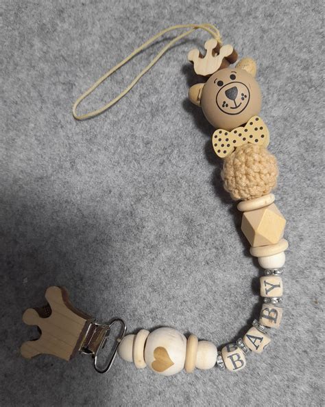 بند پستانک چوبی فانتزی