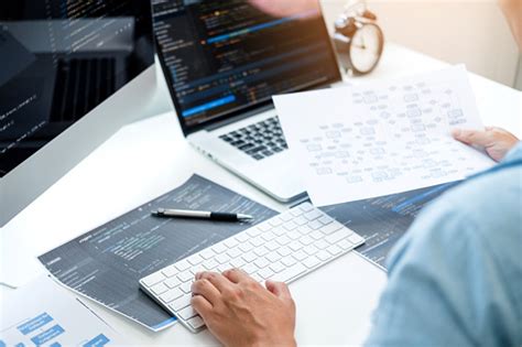 Developing Programmer Development Website Design And Coding Technologies Working At Home Stock