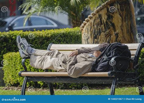 Old Man Sleeping With His Back On A Chair Editorial Photography Image