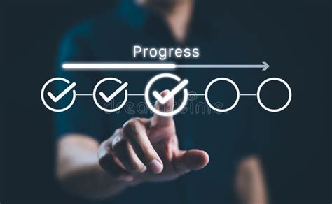 Businessman Touches A Digital Progress Checklist With Check Marks And