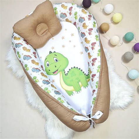 Гнездо кокон двухстороннее с подушкой Динозаврик коричневый Id 1697508522 цена 700