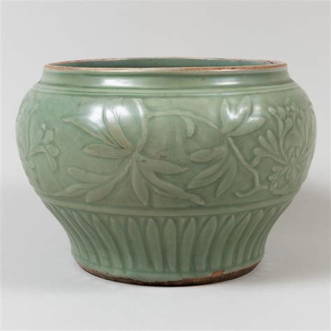 At Auction Chinese Celadon Glazed Pottery Jar