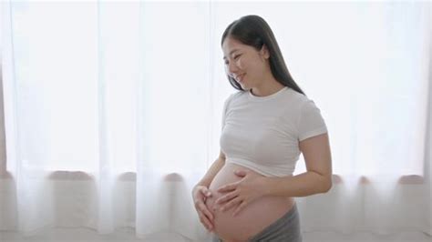 Young Asian Pregnant Woman Hands Fondle Stock Footage Video (100% Royalty-free) 1095032399 ...