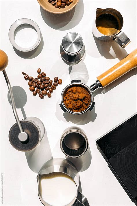 Coffee Making Tools And Ingredients On A White Table Before After By Stocksy Contributor