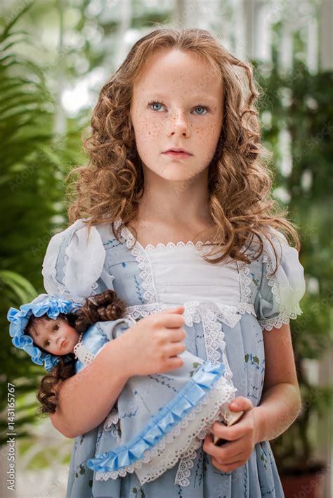 Девочка с веснушками Stock Photo Adobe Stock