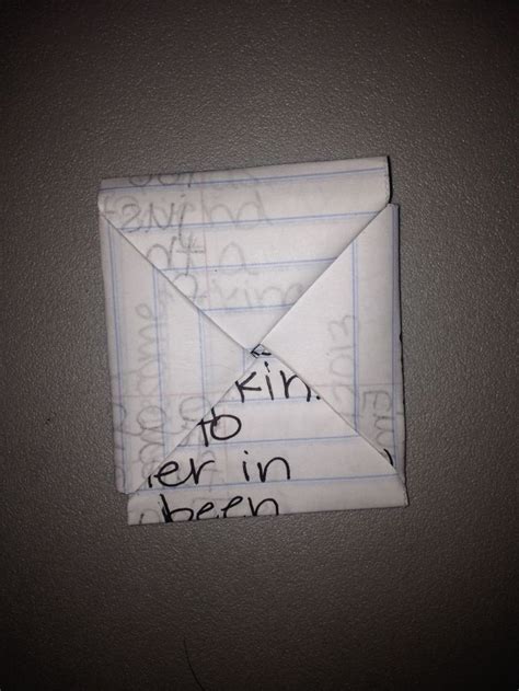 An Origami Envelope With Writing On It