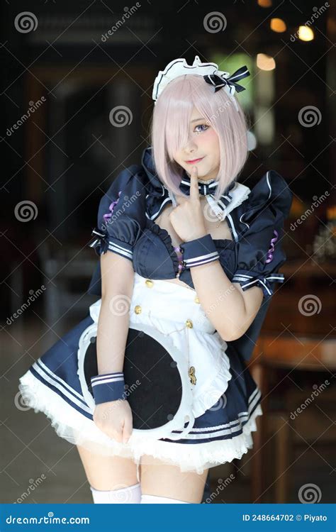 Portrait Of Girl With Japanese Maid Costume In Vintage Restaurant Stock