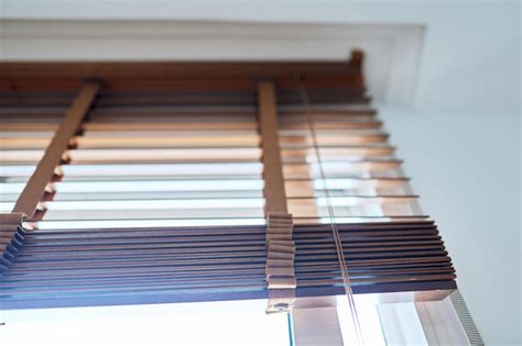 Premium Photo Brown Wooden Blinds In The Interior Closeup