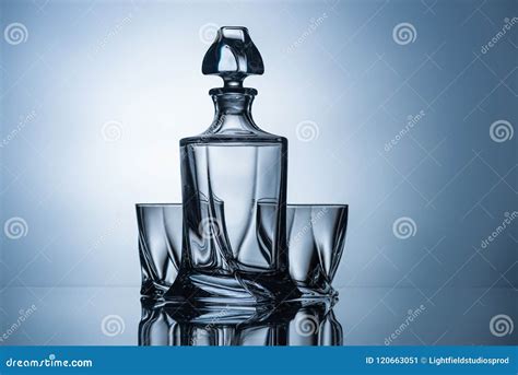 Whiskey Glasses And Empty Bottle On Grey Stock Image Image Of Copy