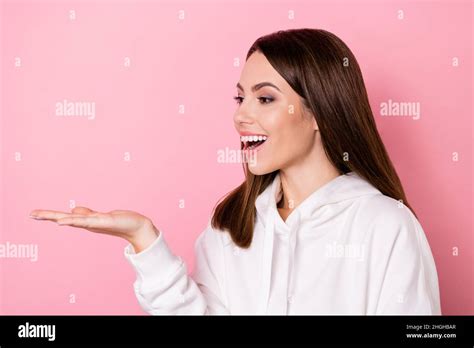 Profile Side View Portrait Of Attractive Cheery Girl Holding On Palm