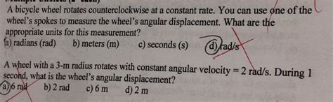 Solved A Bicycle Wheel Rotates Counterclockwise At A Chegg