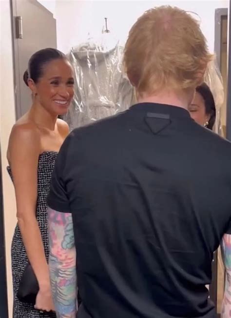 Meghan Markle Flaunts Designer Clothes In Behind Scenes Clip Featuring