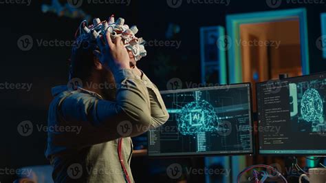 Man Puts Eeg Headset On To Transfer Mind Into Computer Virtual World Becoming One With Ai