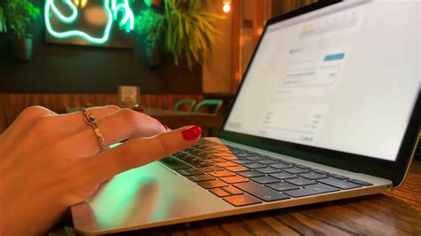 A Woman Sitting In Laptop Scrolling Site Stock Footage SBV