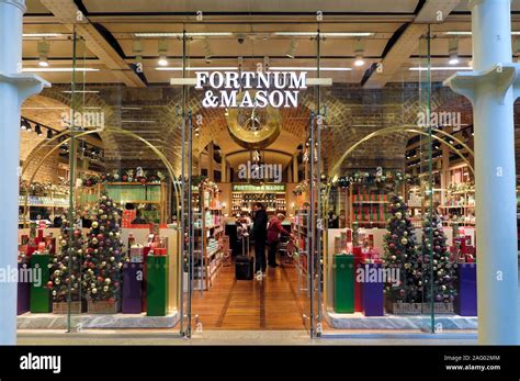 Christmas Shoppers Customers Looking Inside Fortnum And Mason Store In St