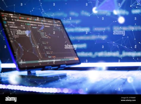 Abstract software development concept with code and laptop on blurred ...