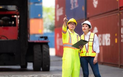Premium Photo Portrait Of Asian Woman Engineer And Worker Working With Coworker At Overseas