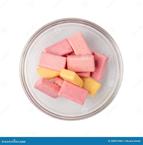 Pile Of Chewable Vitamins On A Yellow Table Royalty Free Stock