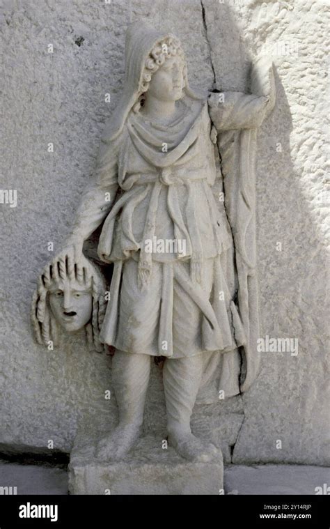 Sculpture Of Melpomene Holding A Tragic Mask Her Attribute In Greek