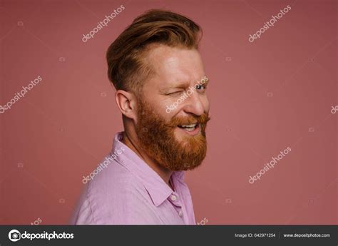 Ginger White Man Beard Winking Smiling Camera Isolated Pink Background
