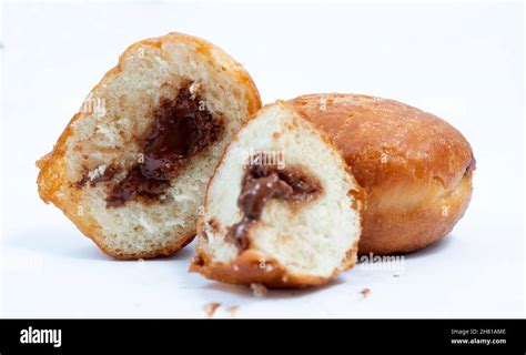 Small Round Donuts With Chocolate Filling On White Background Stock
