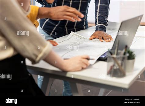 Business People Engaging In Office Space Layout Planning With A