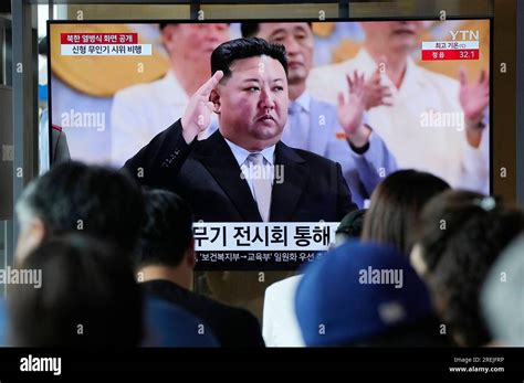 A Tv Screen Shows An Image Of North Korean Leader Kim Jong Un At A