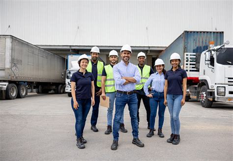 Team Of Employees Working In The Freight Transportation Industry Stock