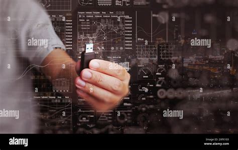 Digital Data Storage And Sharing Technology Concept A Man Holds A Flash Drive Storing Much