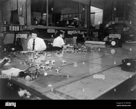 The Royal Navy During The Second World War Looking Across One Of The Map Tables In The Plotting