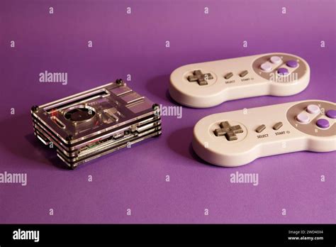 Nintendo Type Video Game Contollers And A Raspberry Pie Computer On A