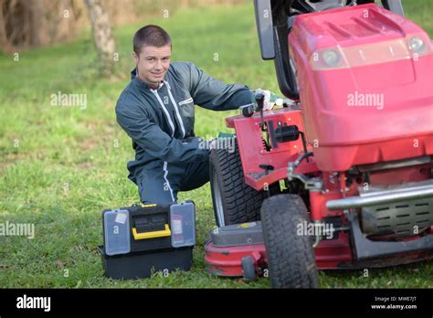 Man Fixing Tractor Hi Res Stock Photography And Images Alamy