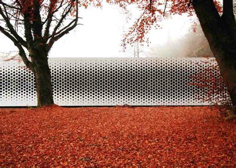 A Scaleless Façade Of Perforated Metal