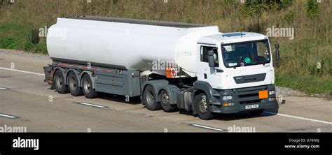 Unmarked White Clean Erf Articulated Fuel Tanker Trailer And Lorry With