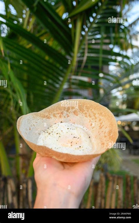 Sri Lankan Street Food Egg Hopper In Woman S Hand Stock Photo Alamy
