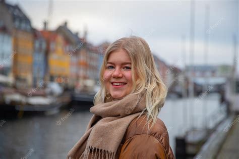 Premium Photo A Teenage Girl Smiles While In Copenhagen The Danish