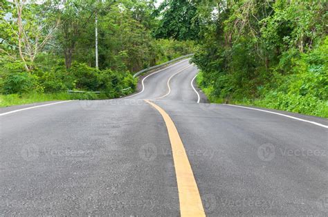 Countryside Road With Trees On Both Sidescurve Of The Road 19988679