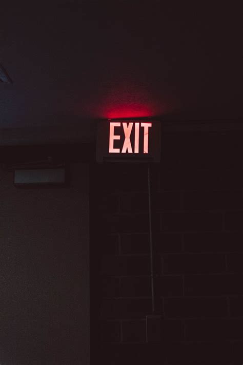 Exit Sign Lit Up In The Dark