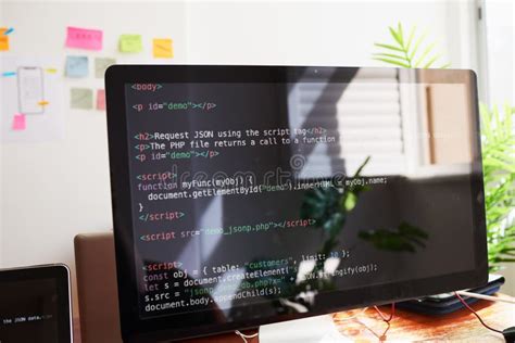 Still Life Of PC Screen With Javascript Coding Demo On Desk In Office Stock Photo Image Of