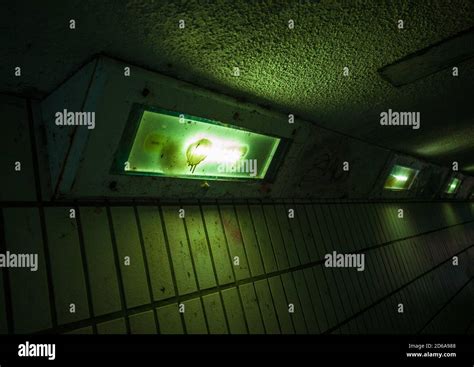 Spooky Green Lighting In A Run Down An Urban Pedestrian Underpass Stock