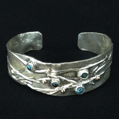 Silver Cornucopia Bangle By Sally Ratcliffe Pyramid Gallery